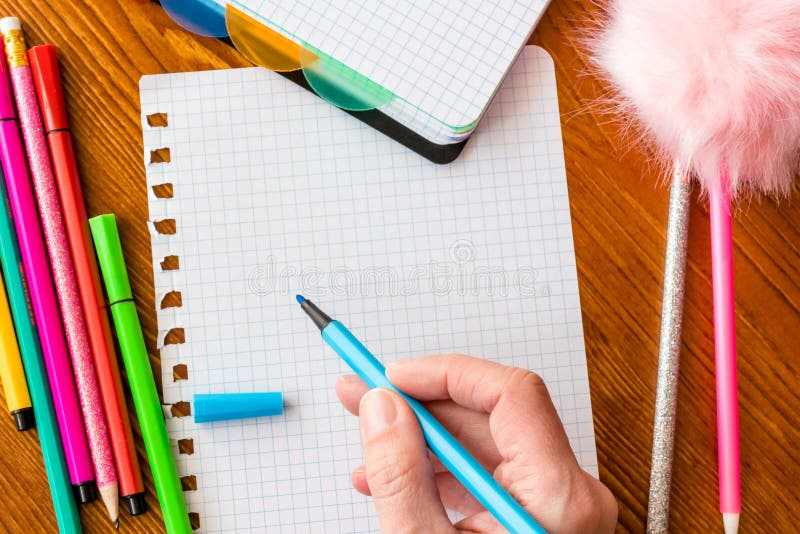 A Hand Holding Blue Felt Tip Pen Stock Photo - Image of design, idea ...