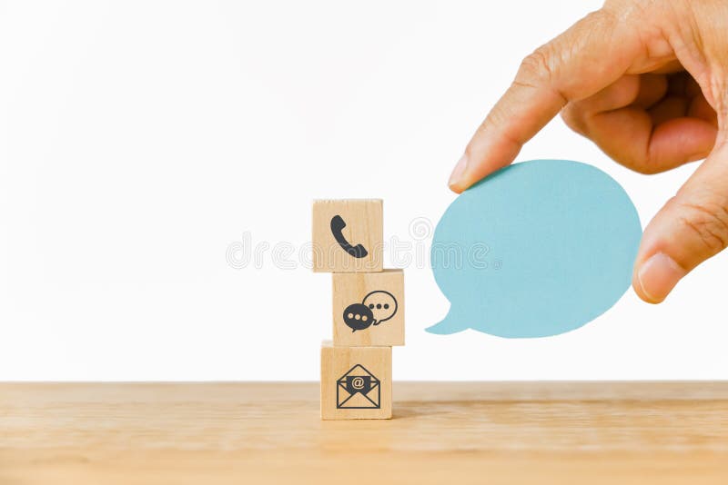 Hand Holding Blue Speech Bubble and Stack of Contact Us Icon on Cube on ...