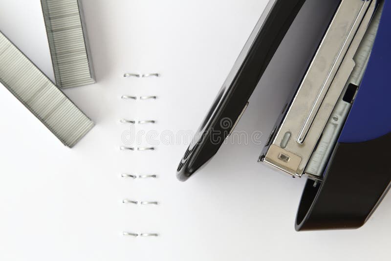Hand Holding Blue Stapler Stapling Papers Stock Photo - Image of hold ...
