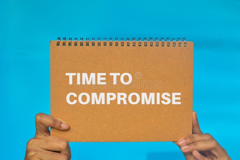 Hand Holding Book Written with Phrase TIME TO COMPROMISE Stock Photo ...