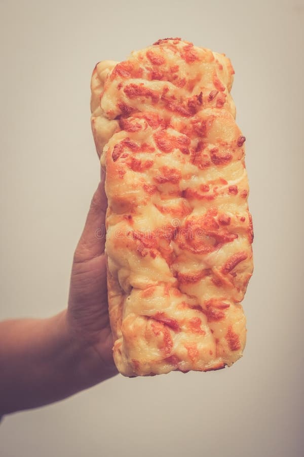 Hand Holding Bread with Hand with Filter Effect Retro Vintage Style ...