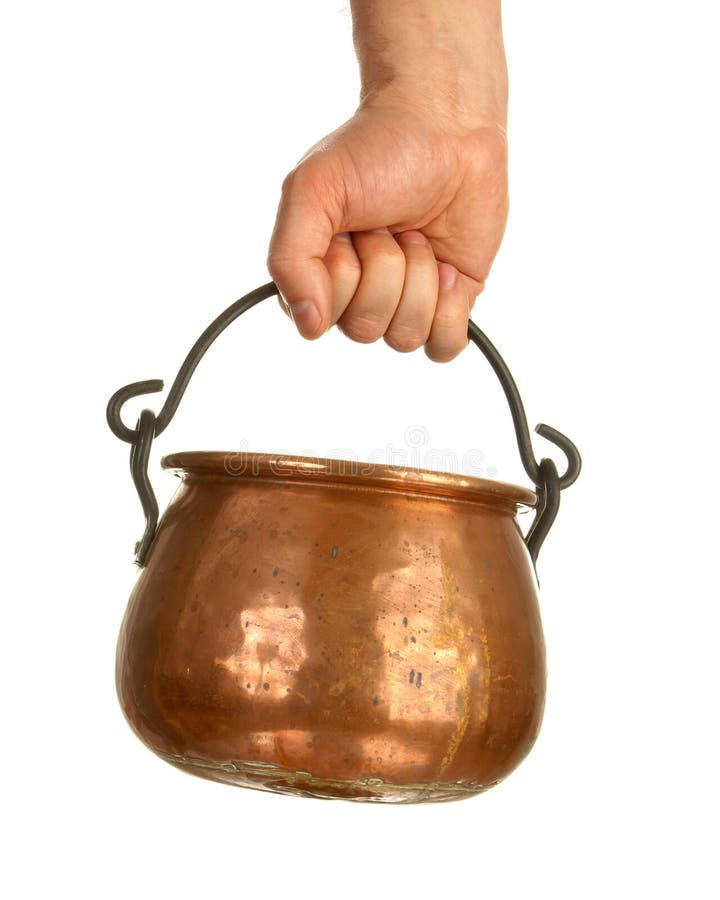 Hand holding bronze pot stock image. Image of bucket - 24922537