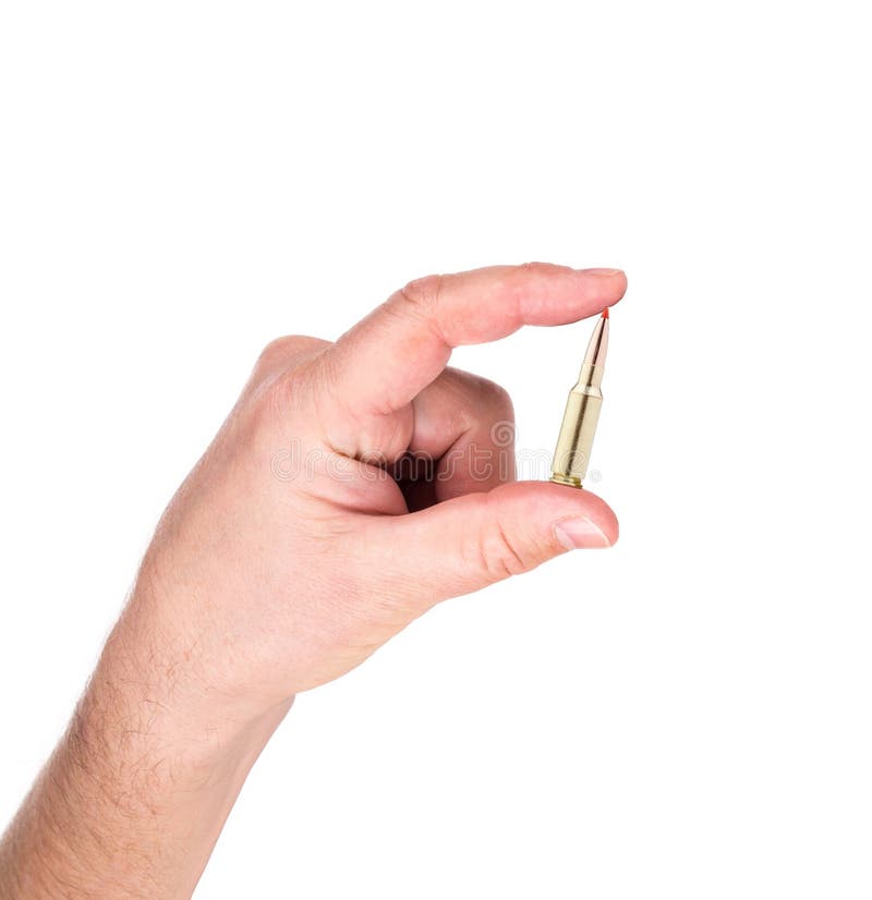 Hand holding bullet stock photo. Image of hostility, bullet - 67085600