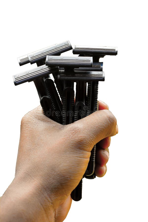 A Hand Holding a Bunch of Shaving Razor Stock Photo - Image of male ...