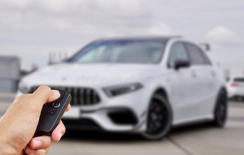 Hand Holding Button on the Remote Car, Motor Vehicle Background, Modern ...