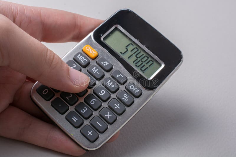 Hand Holding a Calculator in Hand Stock Image - Image of keyboard ...