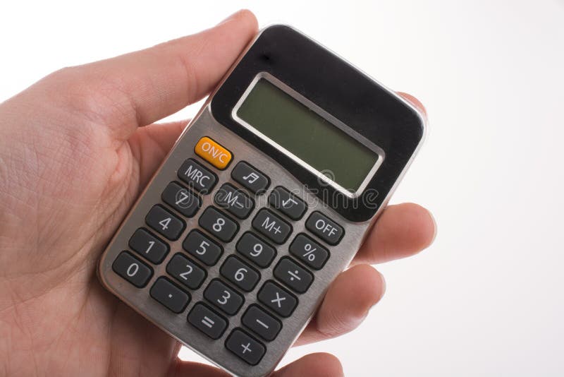 Calculator in hand stock image. Image of buttons, addition - 120501865