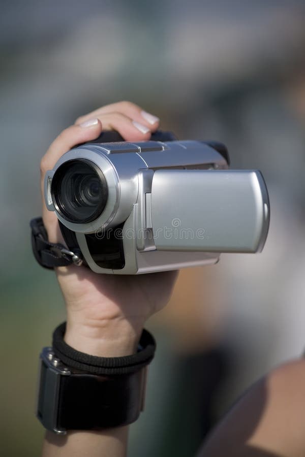 Hand holding camera stock photo. Image of modern, electrical - 7424122