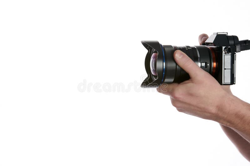 Hand Holding Camera while Isolated on White Stock Image - Image of ...