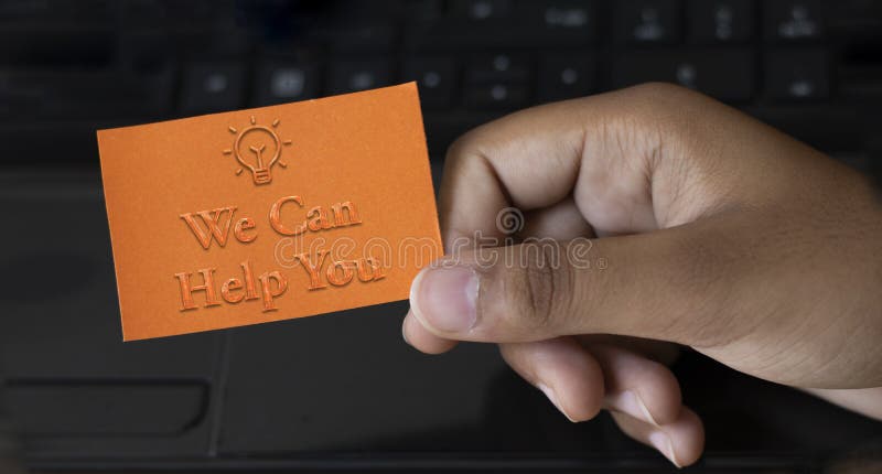 Hand Holding a "we Can Help You" Message on the Card Stock Image ...