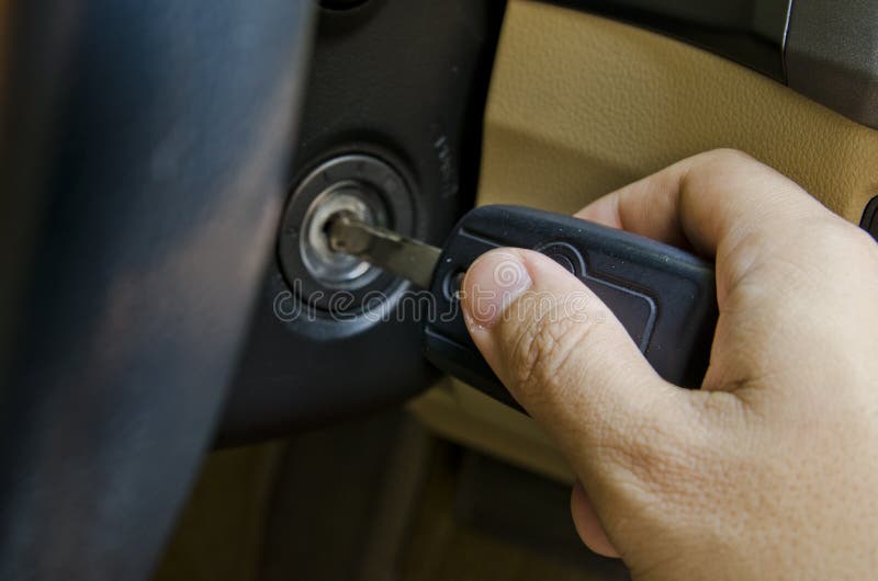 Hand holding car key. stock photo. Image of electrical - 54989920