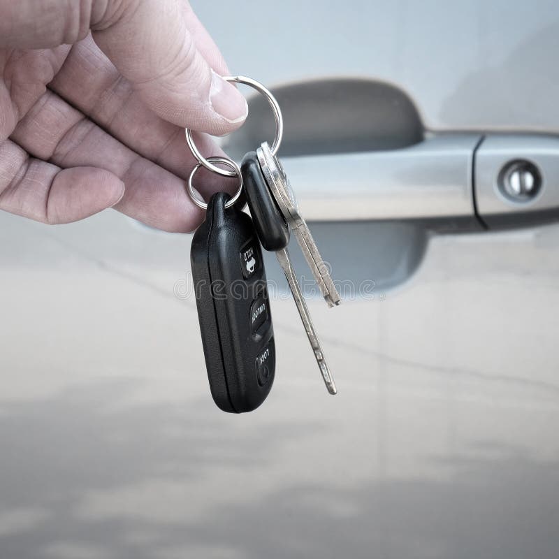 Hand Holding Car Keys in Front of Car Door Stock Image - Image of motor ...