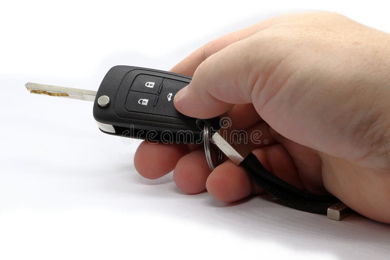 Hand Holding Car Remote Control Key. White Background Stock Photo ...