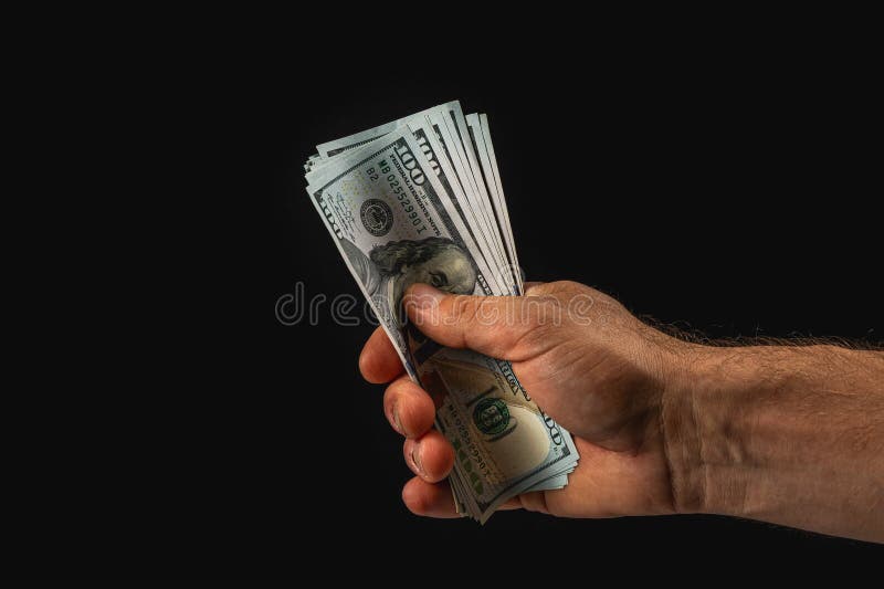 Hand Holding Cash in a Dark Environment at Night Stock Image - Image of ...