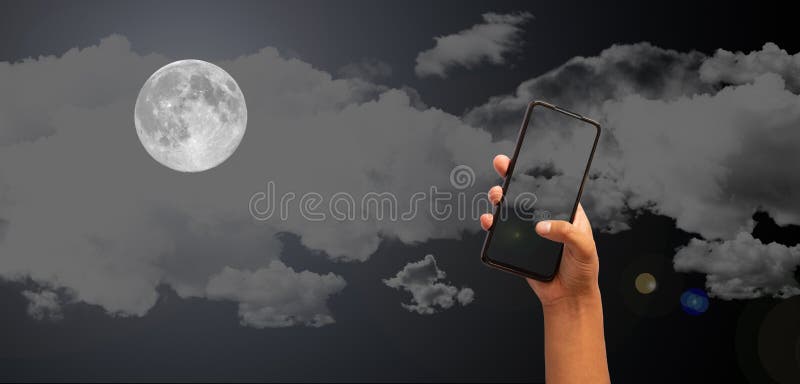 Hand Holding a Cell Phone Capturing the Moon Stock Image - Image of ...