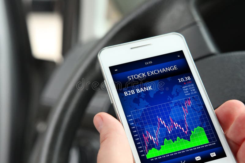 Hand Holding Cellphone with Stock Exchange Screen Stock Image - Image ...
