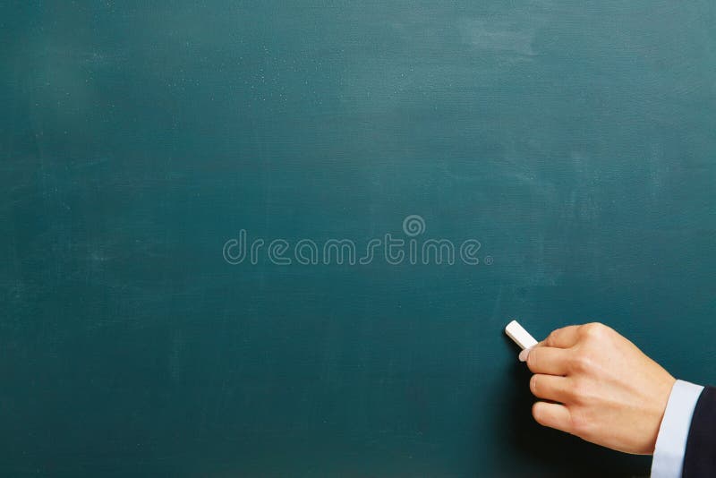 Hand Holding Chalk on a Chalkboard Stock Image - Image of training ...