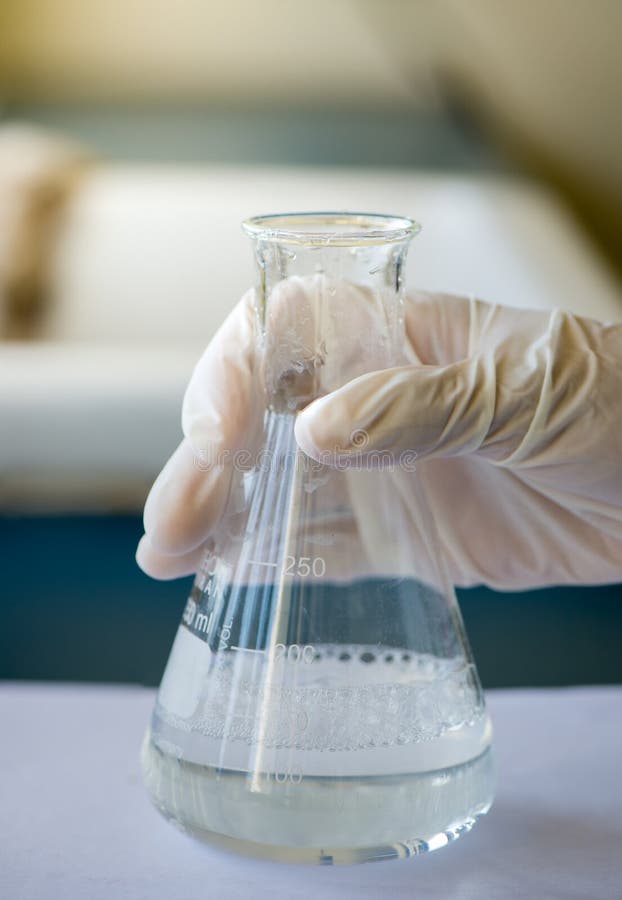 Hand Holding Chemistry Science Flask Stock Image - Image of hand, flask ...