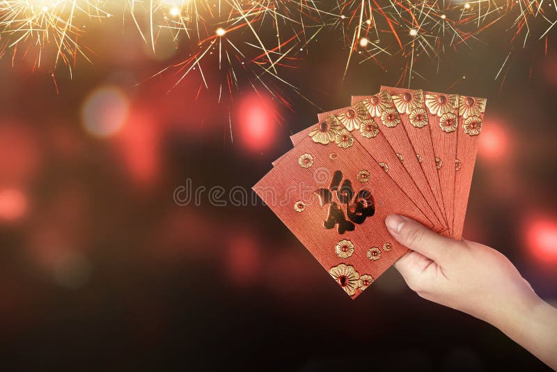Hand Holding Chinese Red Envelope Stock Image - Image of chinese ...