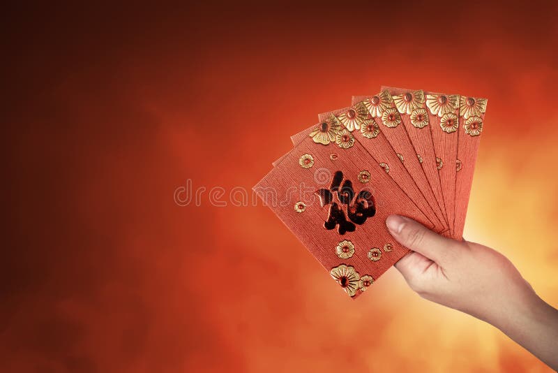 Hand Holding Chinese Red Envelope Stock Photo - Image of celebration ...