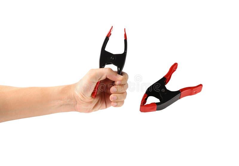 Hand Holding a Clamp Isolated on a White Background. Stock Image ...