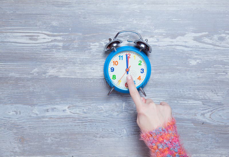 Hand holding clock stock photo. Image of second, minute - 46348168