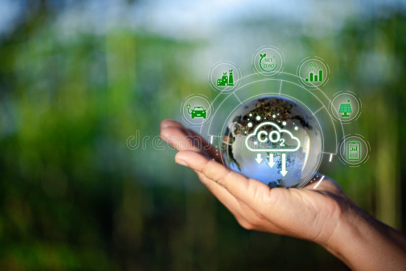Hand Holding CO2 Reducing Icon with Virtual World for Decrease Carbon Dioxide Emission, Carbon ...