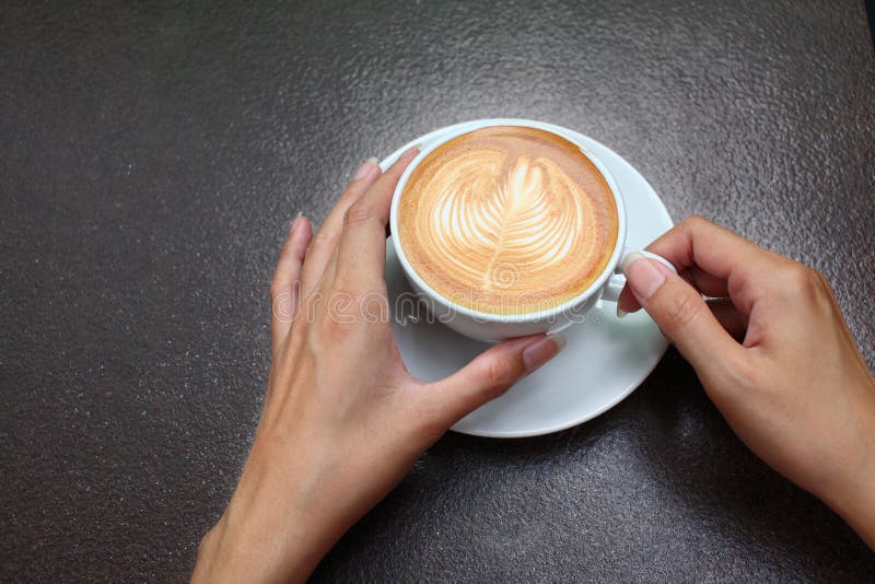 Hand holding coffee cup. stock image. Image of cafe, enjoy - 26060219
