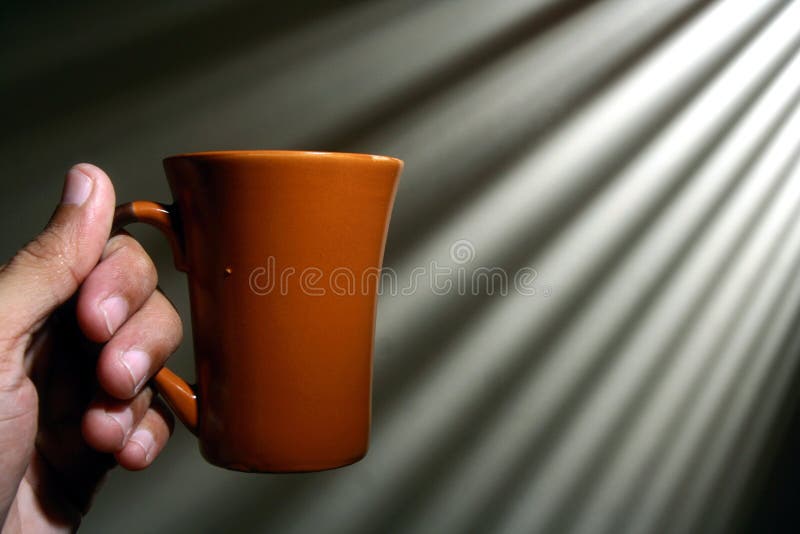 Hand holding a coffee mug stock photo. Image of knuckles - 56601220