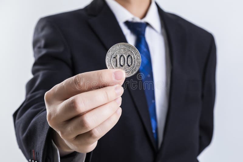 A hand holding a coin stock photo. Image of gentleman - 250524402