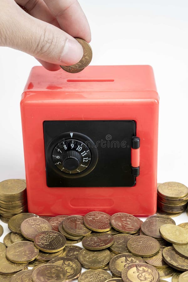 Hand Holding Coins and Put into Red Safe Box Stock Photo - Image of ...