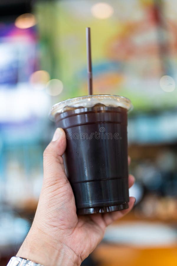Hand Holding Cold Americano in Clear Plastic Cup Stock Image - Image of ...