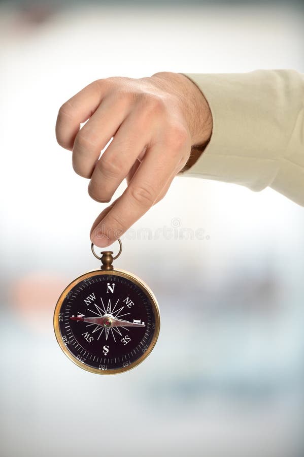 Hand Holding Compass stock photo. Image of concept, businessman - 59000840