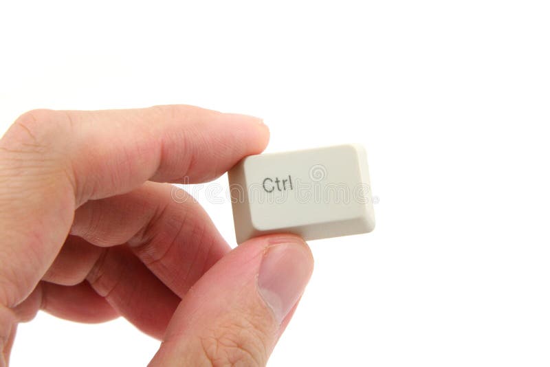 Hand holding control key stock image. Image of computer - 1656427