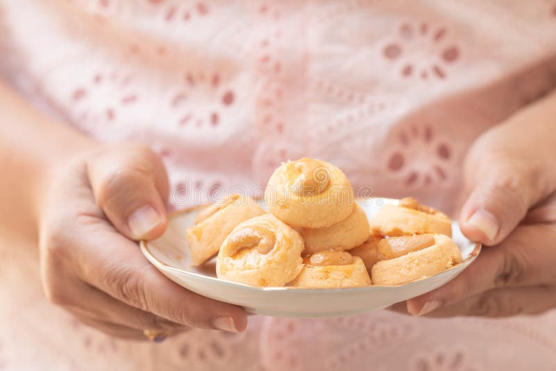 Hand Holding Cookies Singapore or Cashew Cookies Stock Photo - Image of ...
