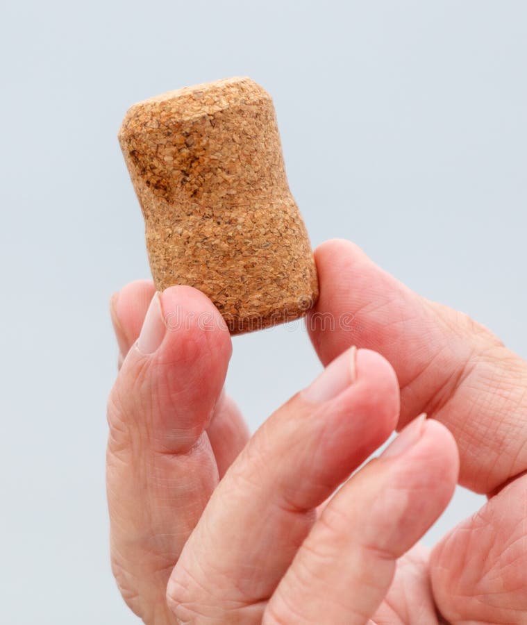 A Hand Holding a Cork Stopper Stock Image - Image of grape, cork: 382154479