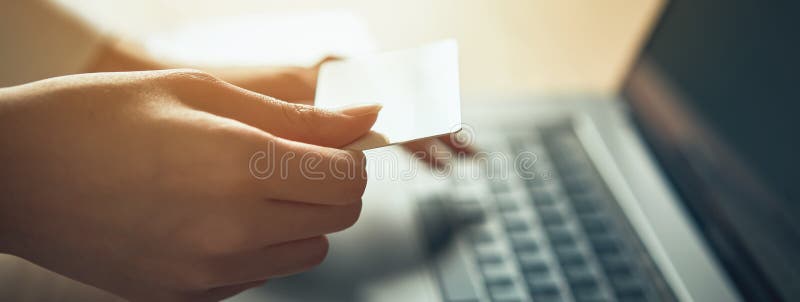 Hand Holding Credit Card and Press Laptop Computer Enter the Payment ...