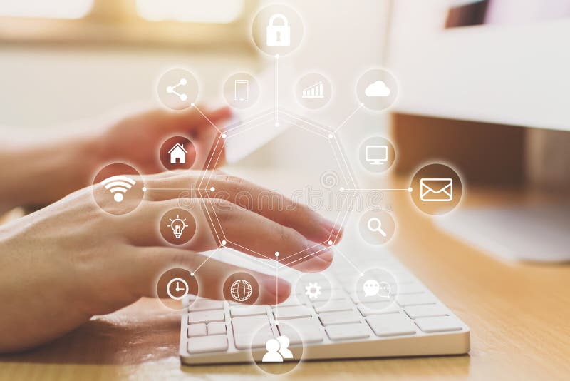 Hand Holding Credit Card and Using Computer Desktop with Icon ...