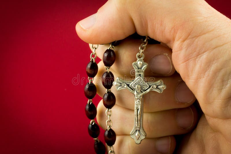 Holding a crucifix stock photo. Image of beads, rosary - 30308800