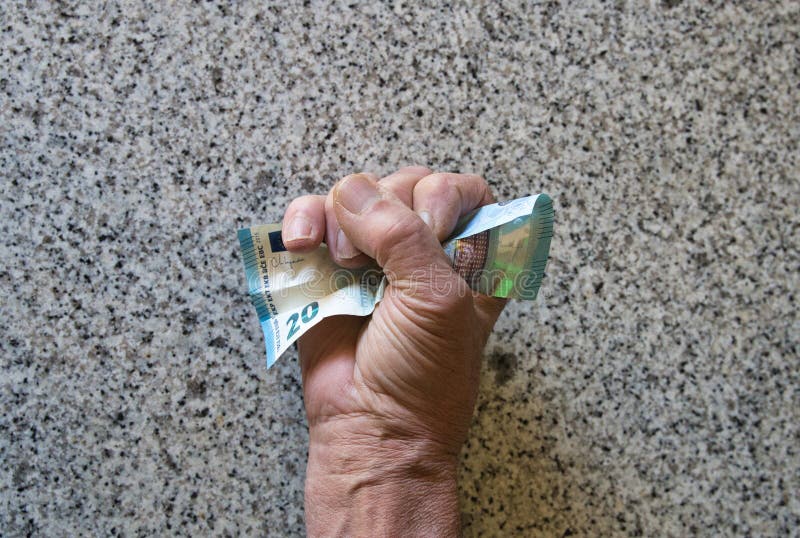 Hand Holding a Crumbled Euro Bill the Value of Money Stock Photo ...