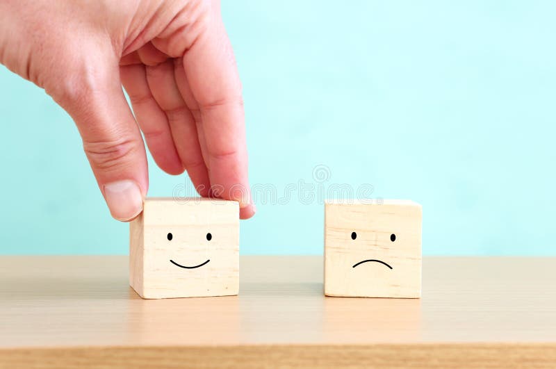 Hand Holding Cube with Happy Face. Concept of Happiness Emotion and ...