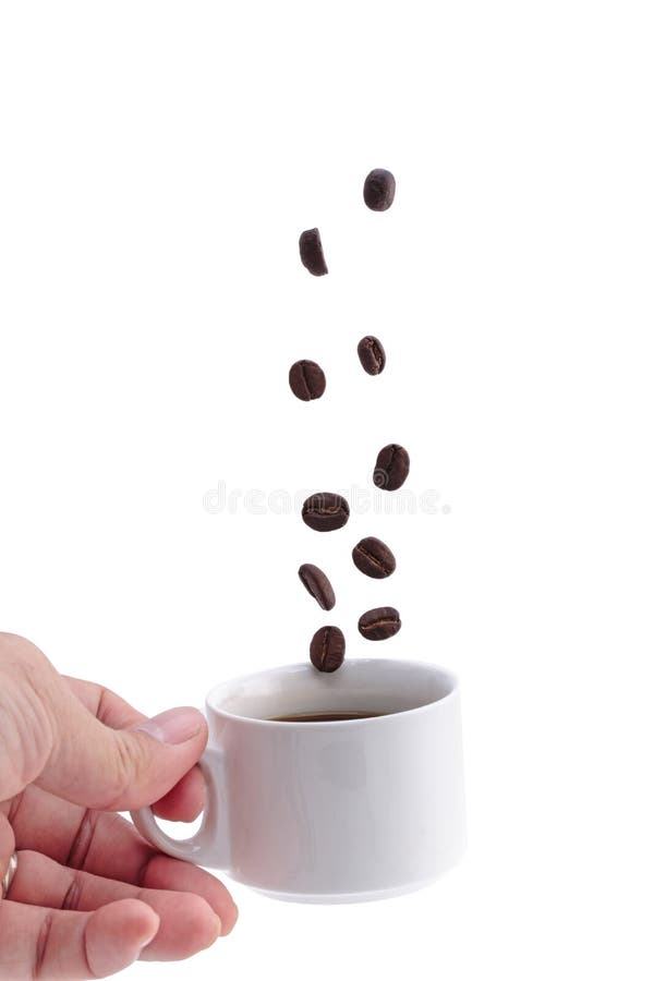 The Hand Holding Cup of Coffee with Falling Beans on White. Stock Image ...