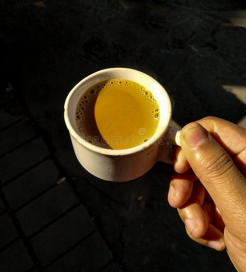 A Hand Holding Cup of Tea & X28; Chai Stock Image - Image of cold ...