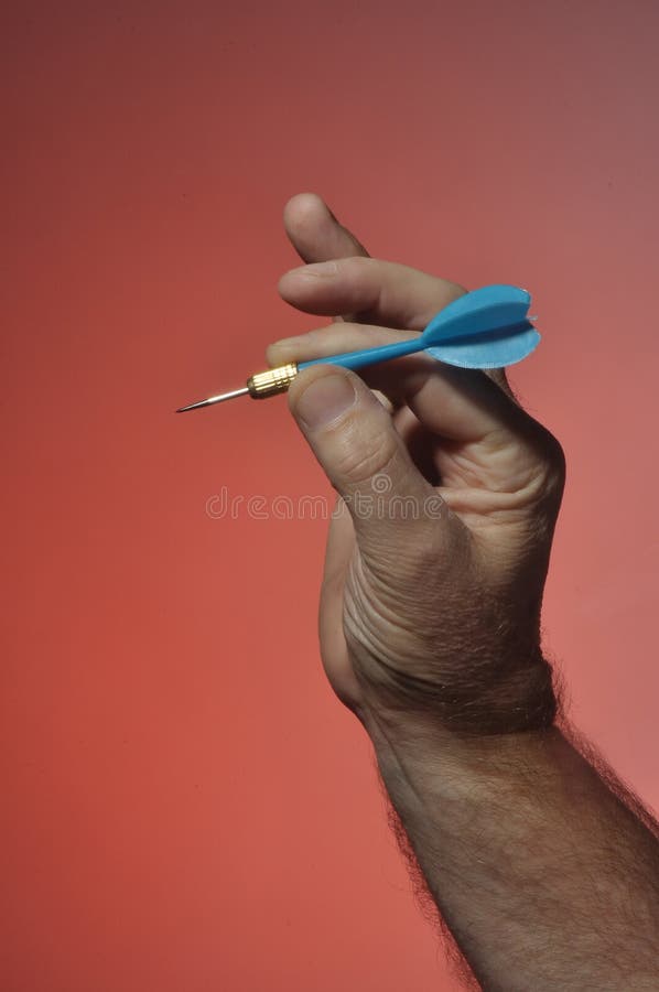 Hand holding dart stock image. Image of hand, hold, leisure - 21464041