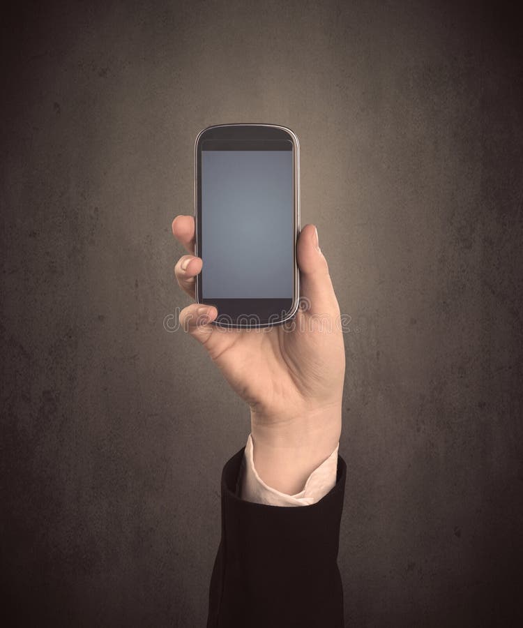 Hand holding device stock photo. Image of smartphone - 79558902