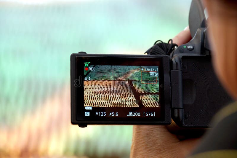 Hand Holding the Digital Camera, Shoot of Landscape Photo Using ...