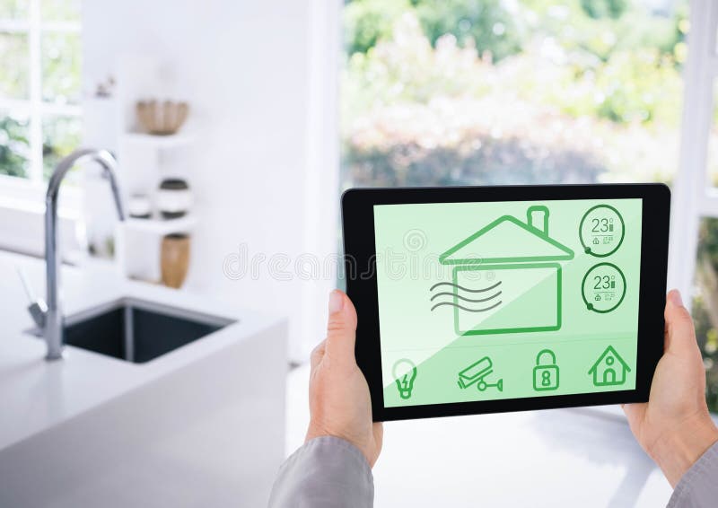 Hand Holding Digital Tablet with Home Security Icons on Screen Stock ...