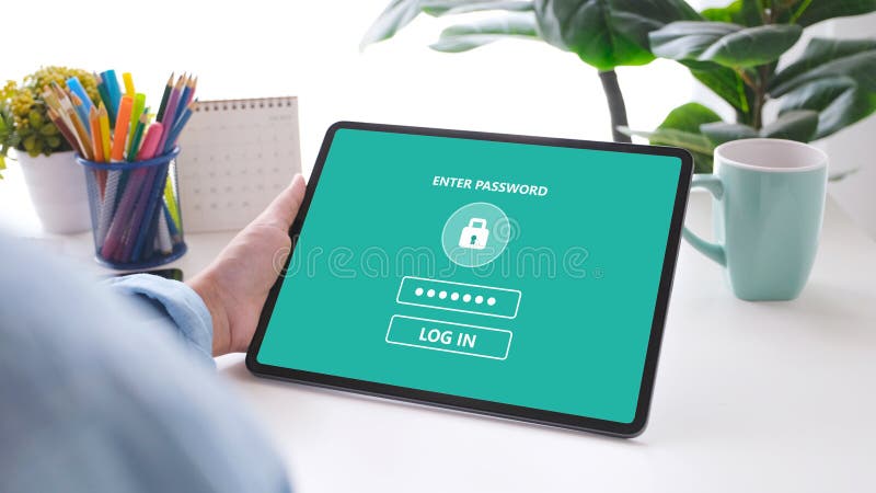 Hand Holding Digital Tablet with Password Login on Screen at Working ...