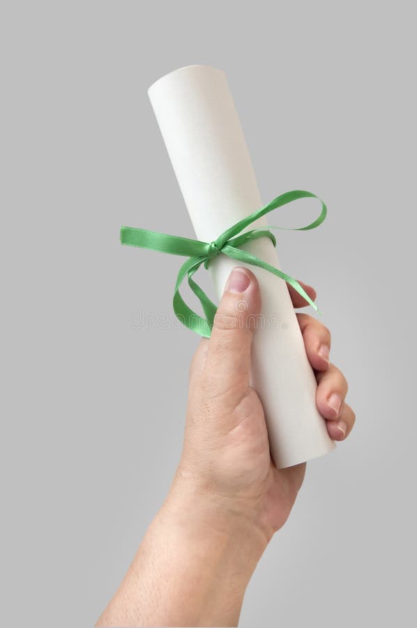 Hand Holding Diploma stock image. Image of grab, education - 10013117