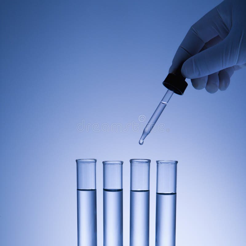 Hand holding dropper. stock image. Image of test, still - 2851239